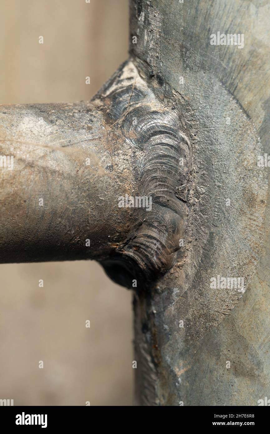 Welded seam at the junction of two welded water pipes macro Stock Photo ...