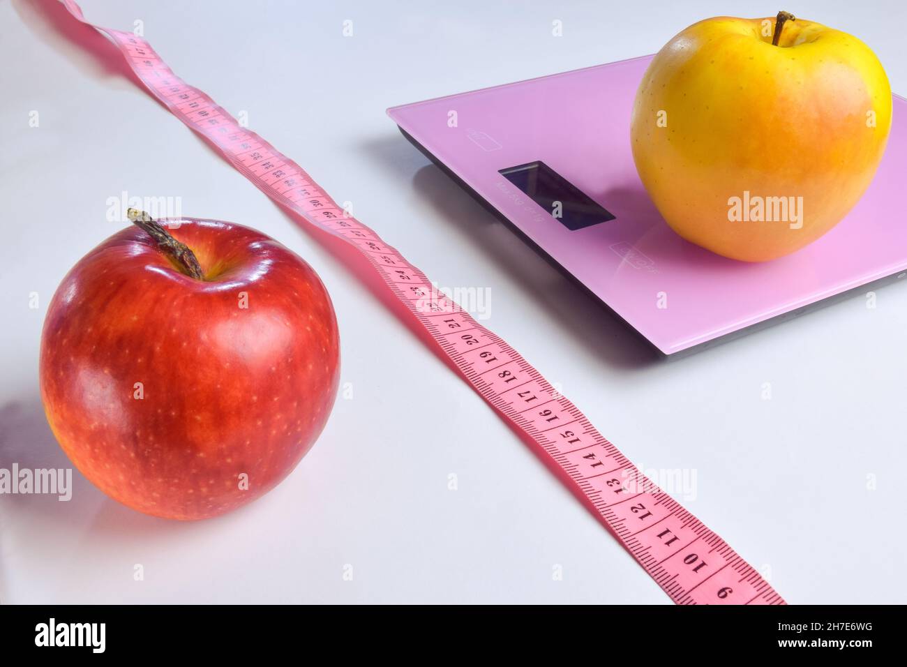 Two apples ruler hi-res stock photography and images - Alamy