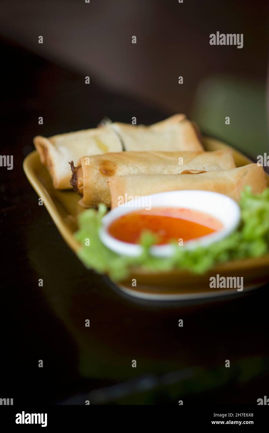 Spring rolls with a dip at a market in China Town (Bangkok, Thailand ...