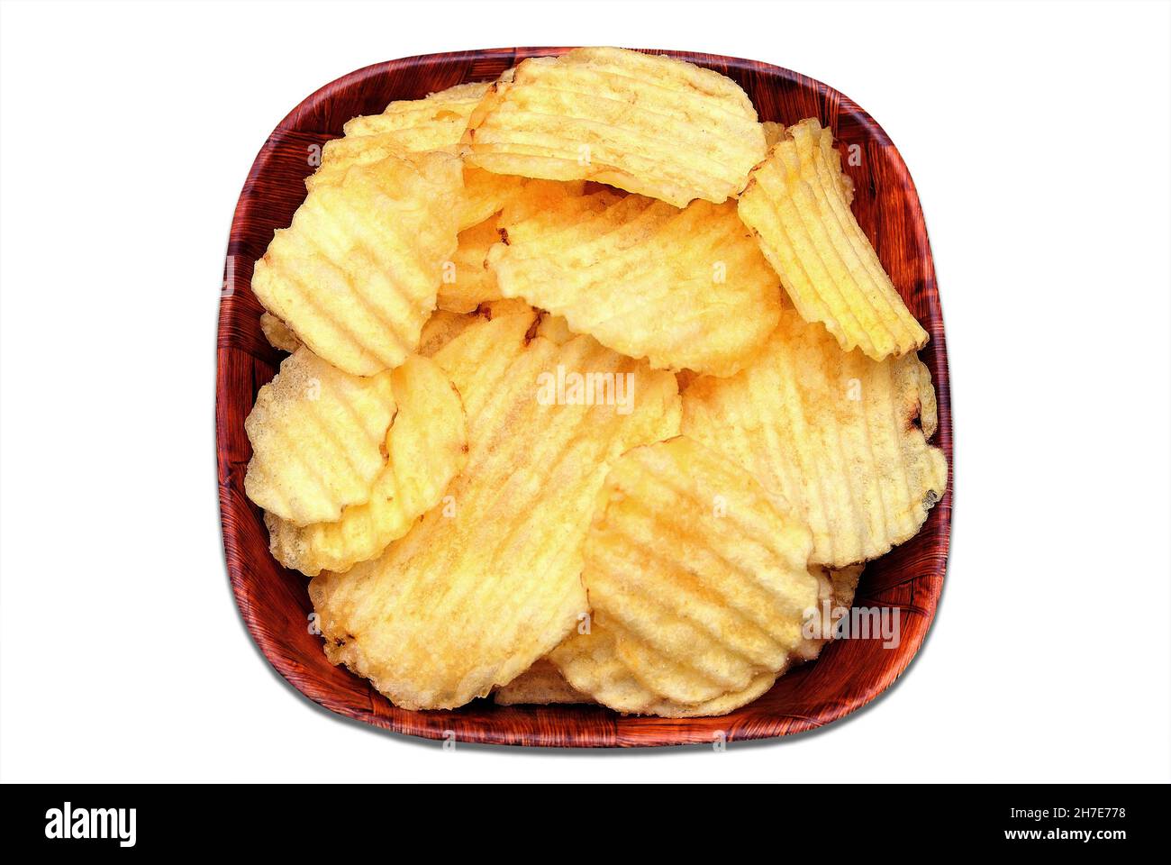 Ribbed potato chips in a bowl on a white background Stock Photo - Alamy
