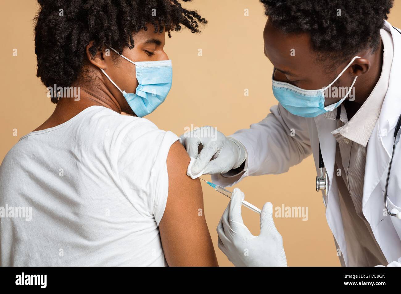 Female patient getting an injection in the clinic hi-res stock ...