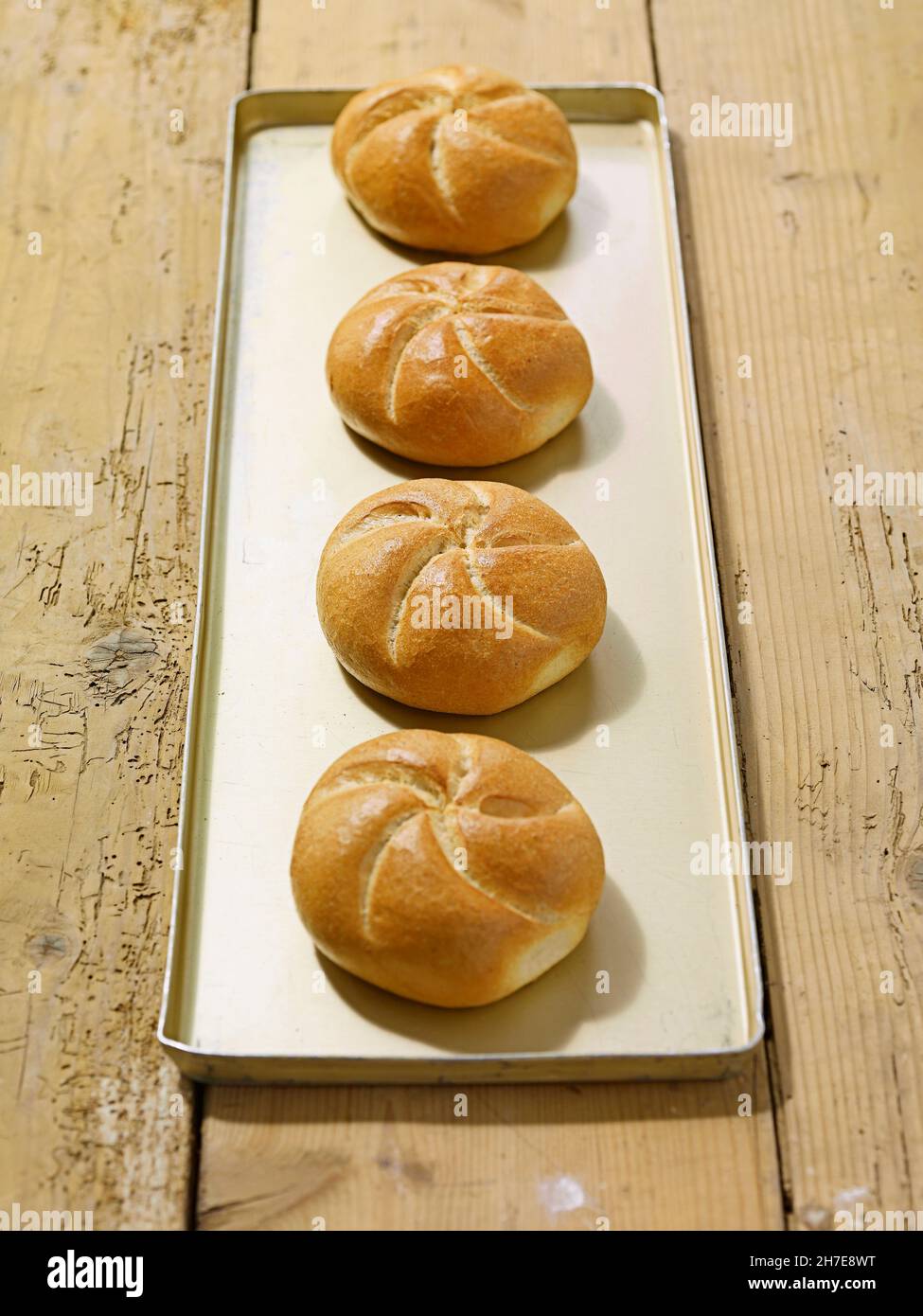 Four fresh bread rolls Stock Photo - Alamy