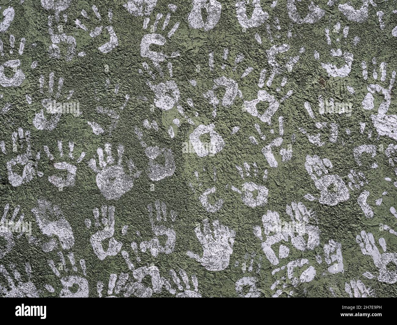 Drawing of handprints on a wall Stock Photo - Alamy