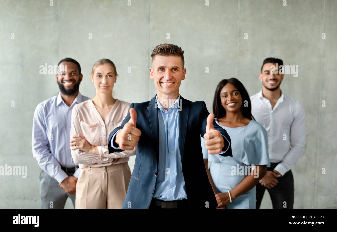 Team Of Professionals. Portrait Of Multiethnic Business People With ... Team Of Professionals. Portrait Of Multiethnic Business People With ...