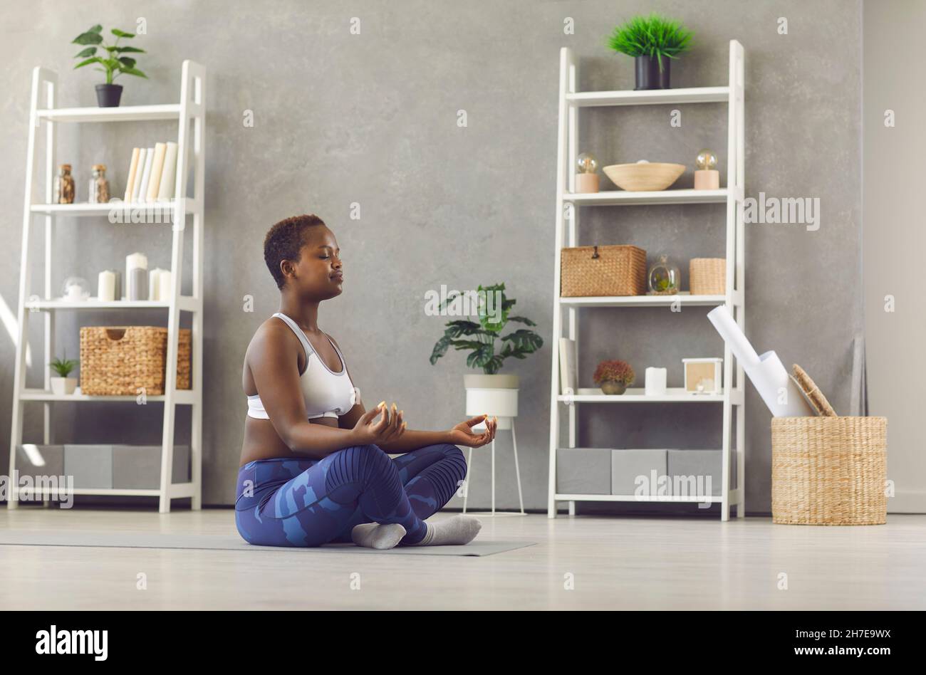 Black woman person meditating hi-res stock photography and images - Alamy