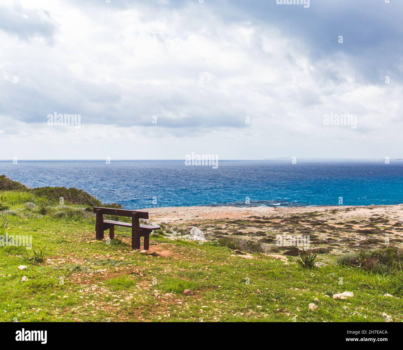 Stone bench coast in cyprus hi-res stock photography and images - Alamy