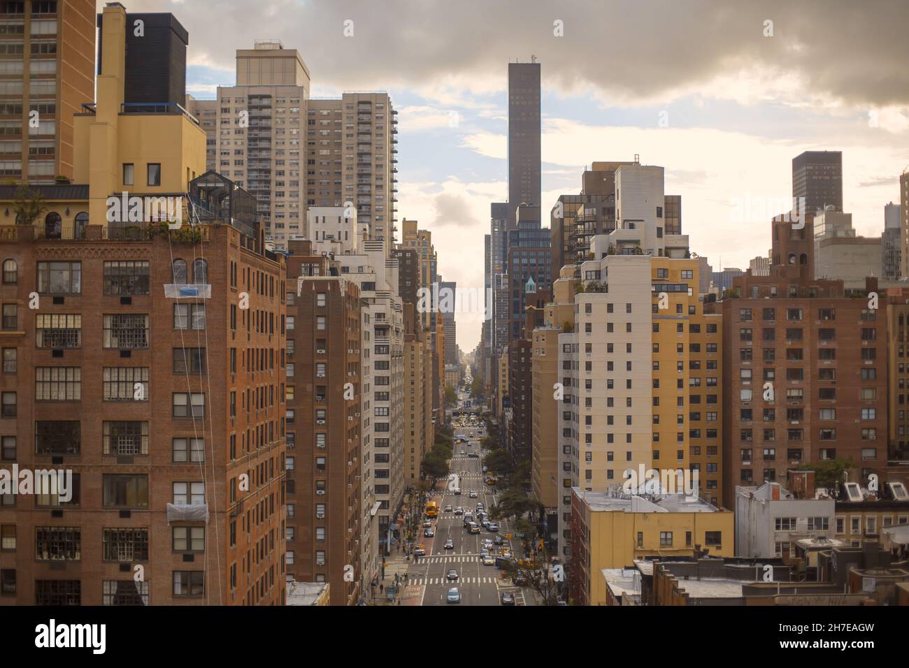 Aerial view of a cityscape with tall buildings under a cloudy sky Stock ...