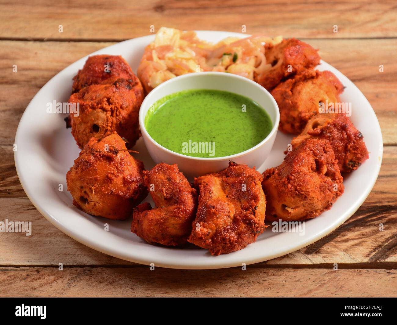 Assorted indian food Chicken Tikka kebab served on rustic wooden ...