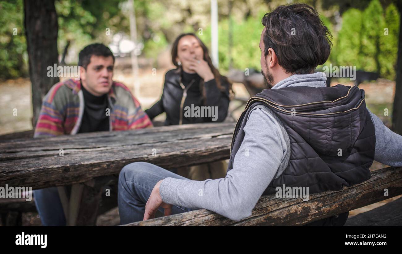 Person smoking in public park hi-res stock photography and images - Alamy