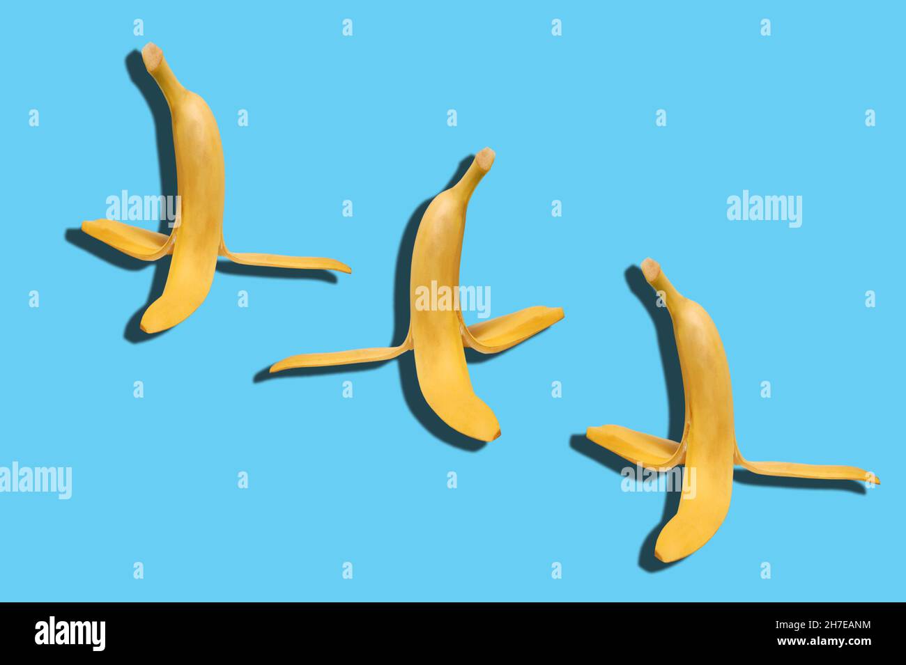 Peeled banana on blue hi-res stock photography and images - Alamy