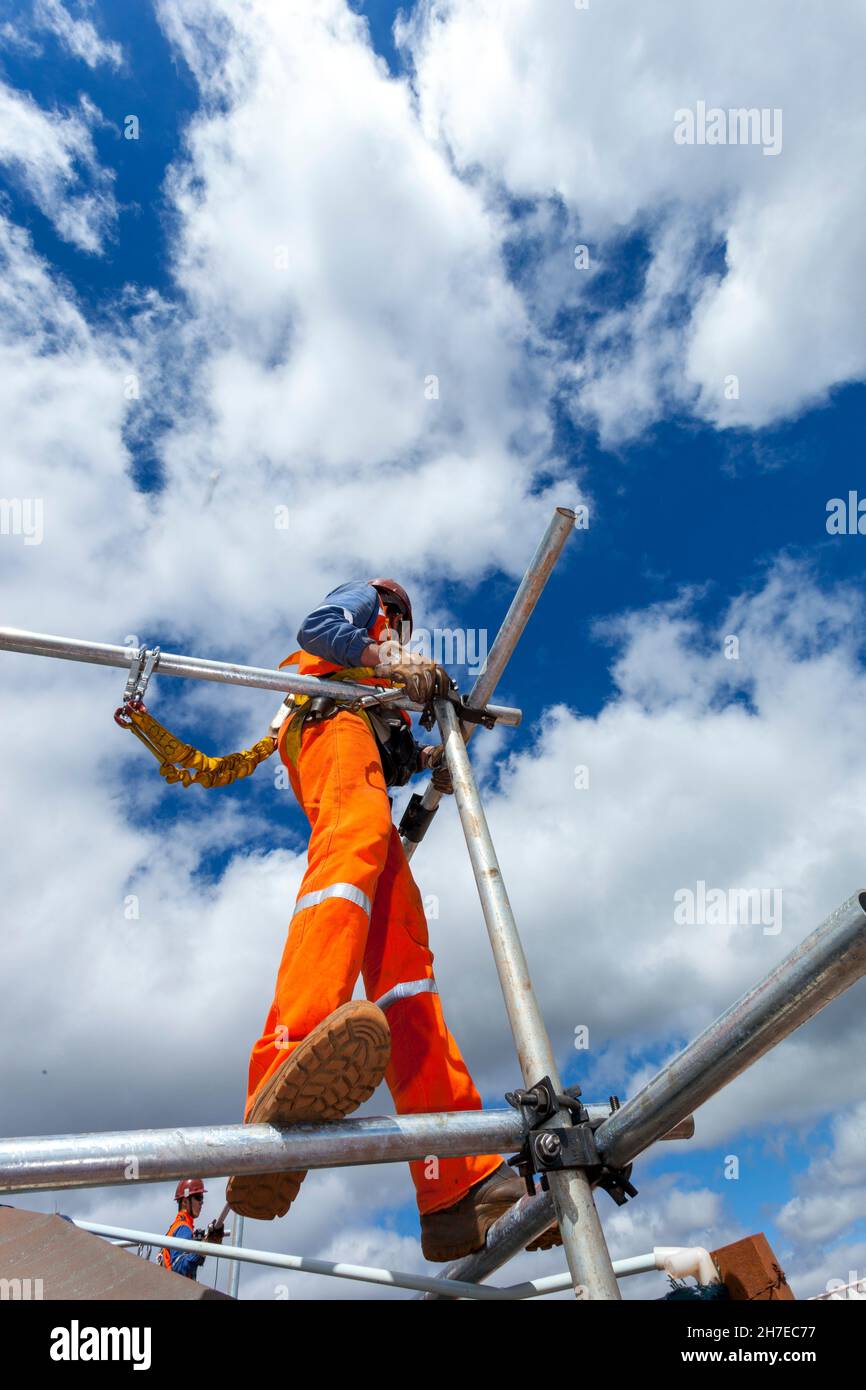 construction worker on a scaffold Stock Photo - Alamy