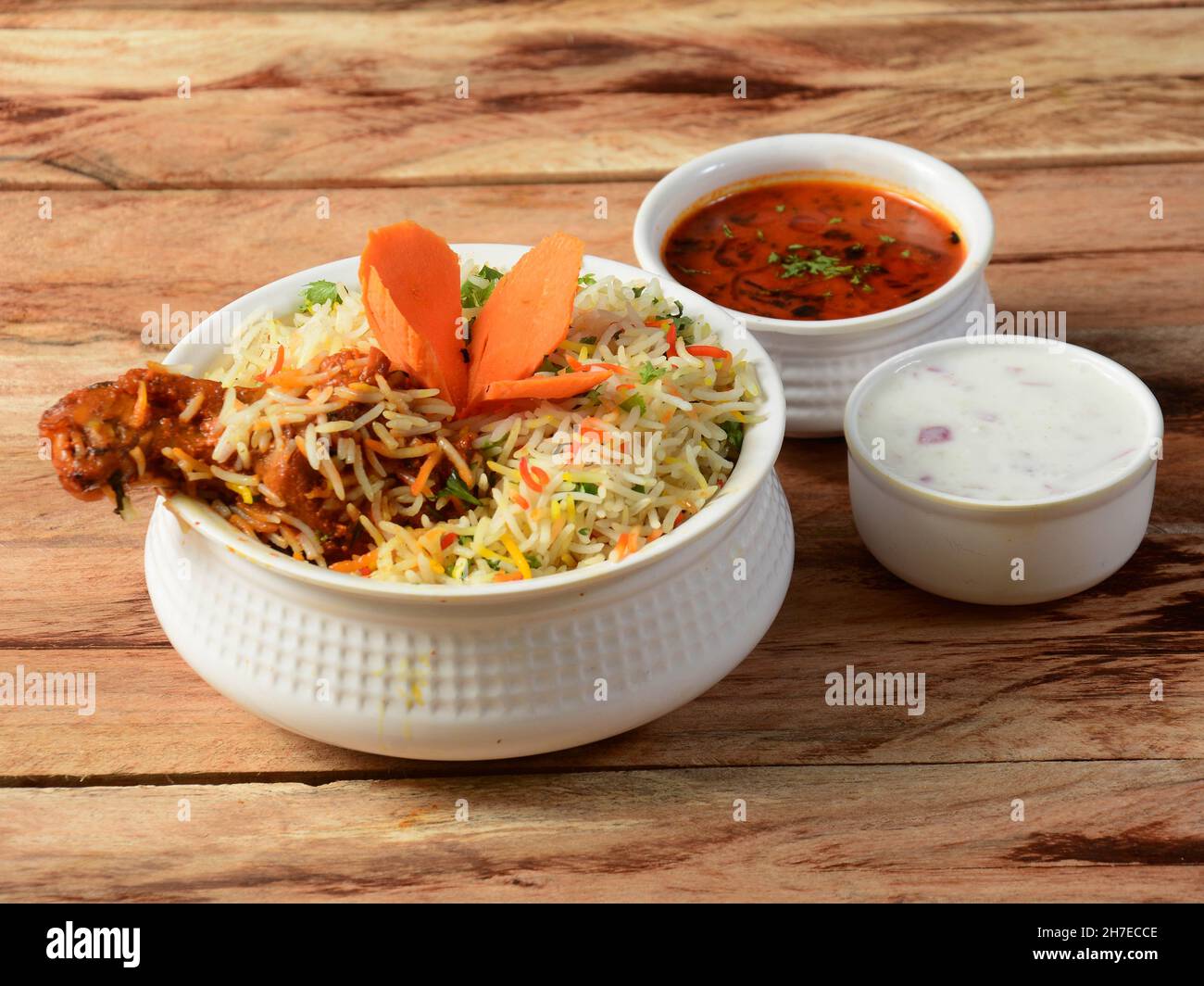 Traditional Hyderabadi Chicken dum Biryani made of Basmati rice cooked ...