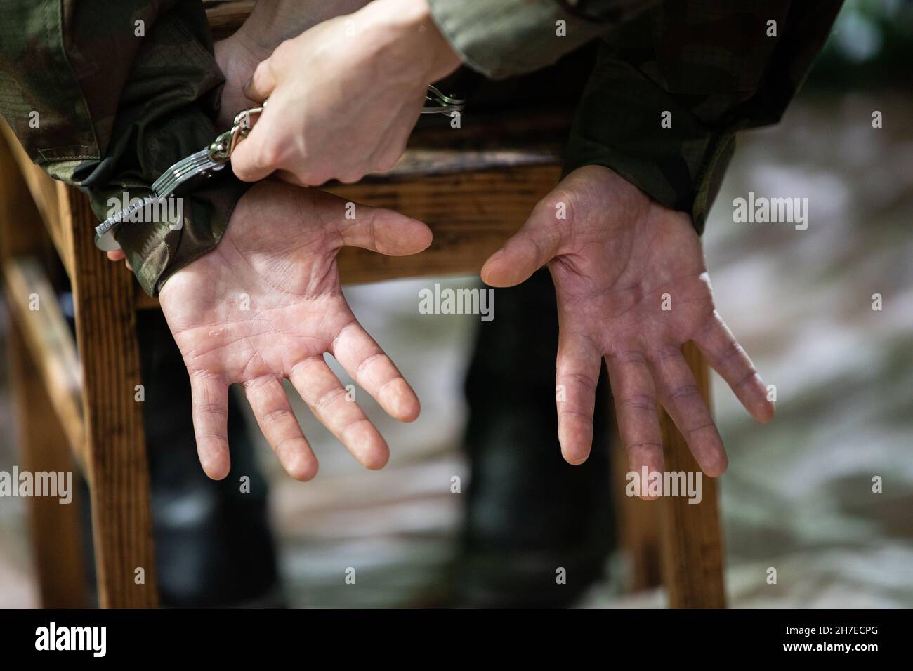 Handcuffing suspect hi-res stock photography and images - Alamy