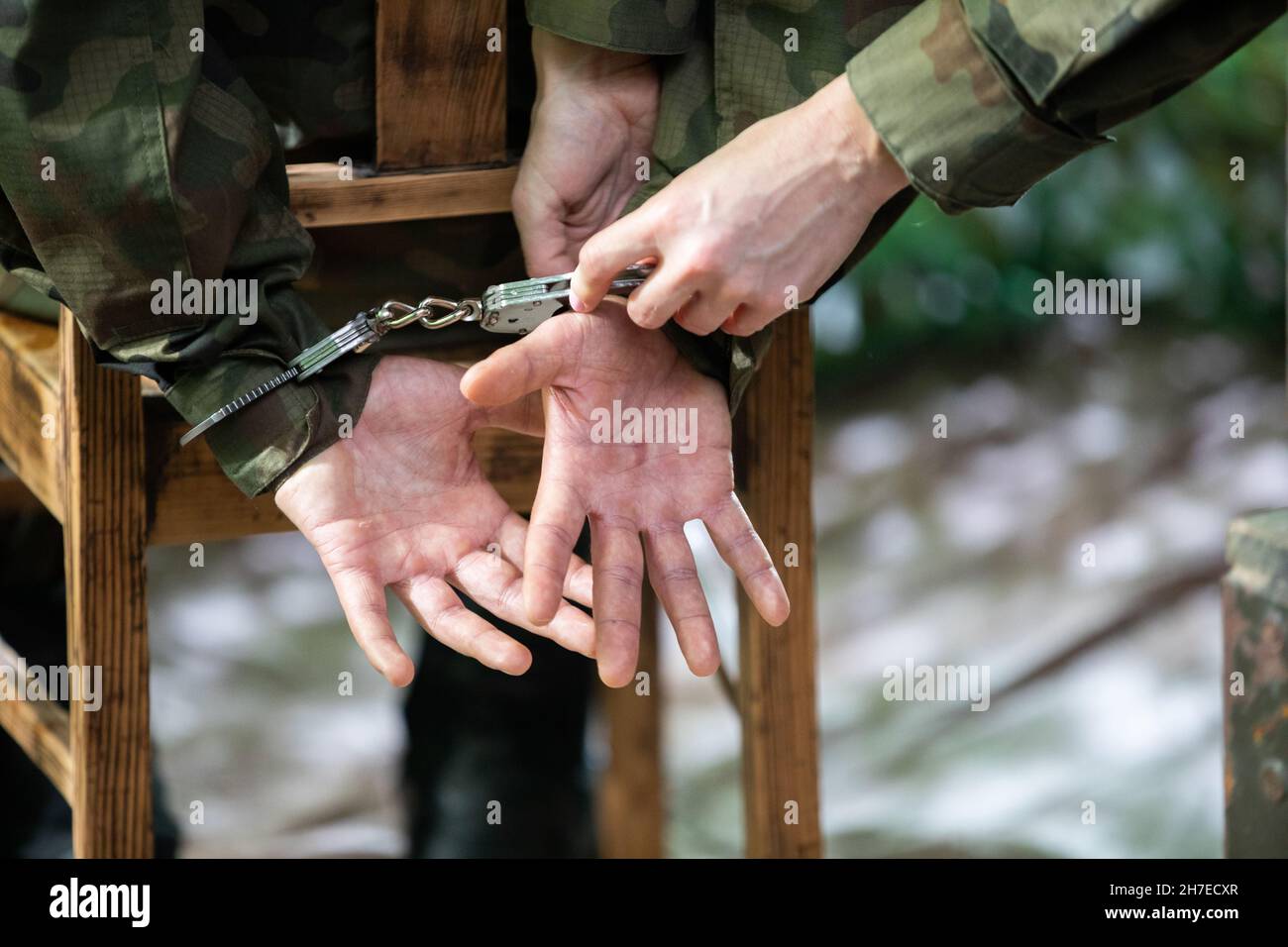 Handcuffing suspect hi-res stock photography and images - Alamy