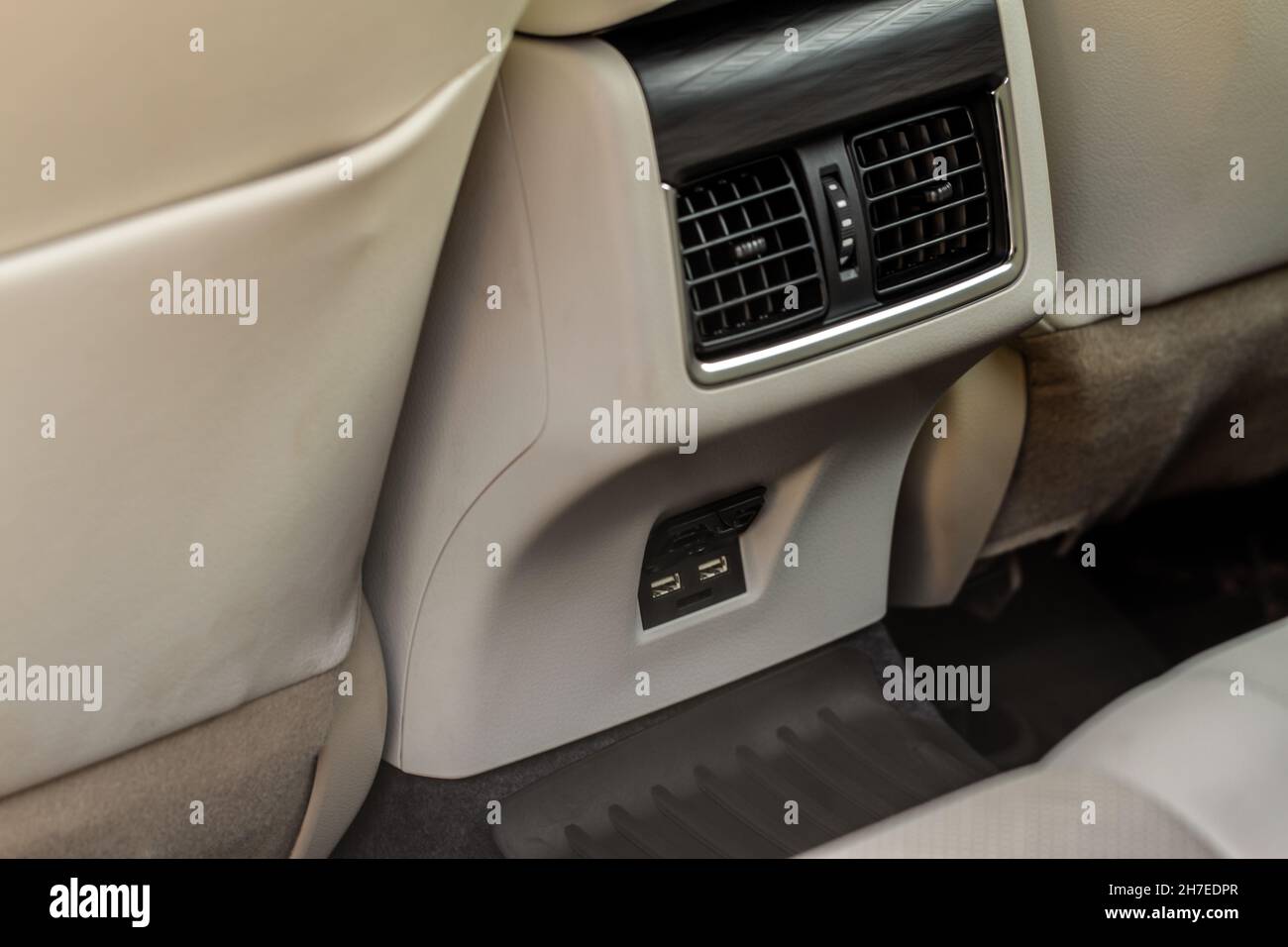 Opened car USB port in the car for connecting device. Power output of ...