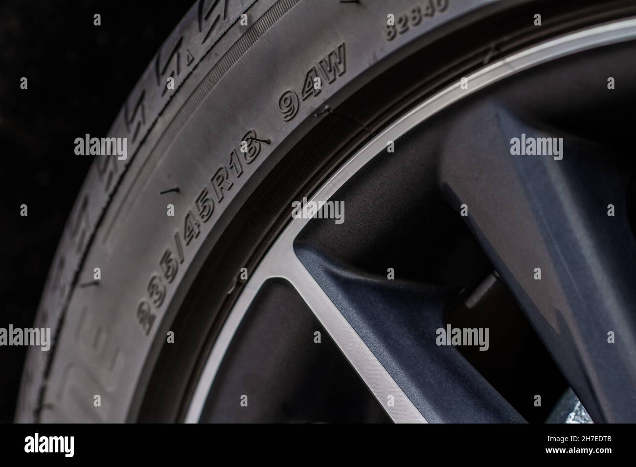 Close up view of tire with tire width, height and wheel diameter ...