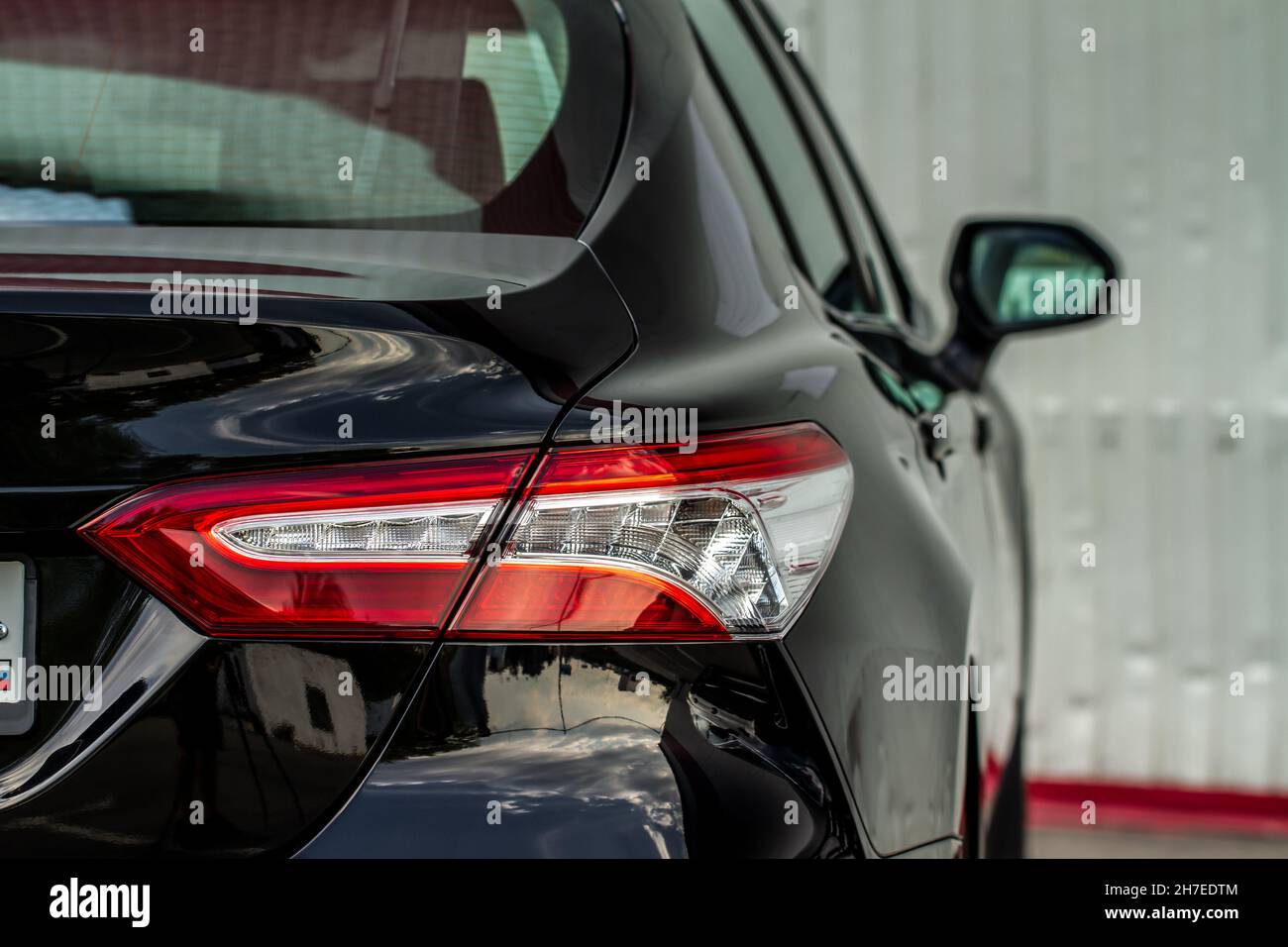 Modern rear light of a car. Brake light and arrow of large suv. Rear ...