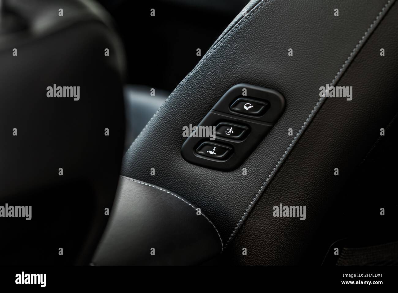 Electric car seat adjustment control panel close up view on the ...
