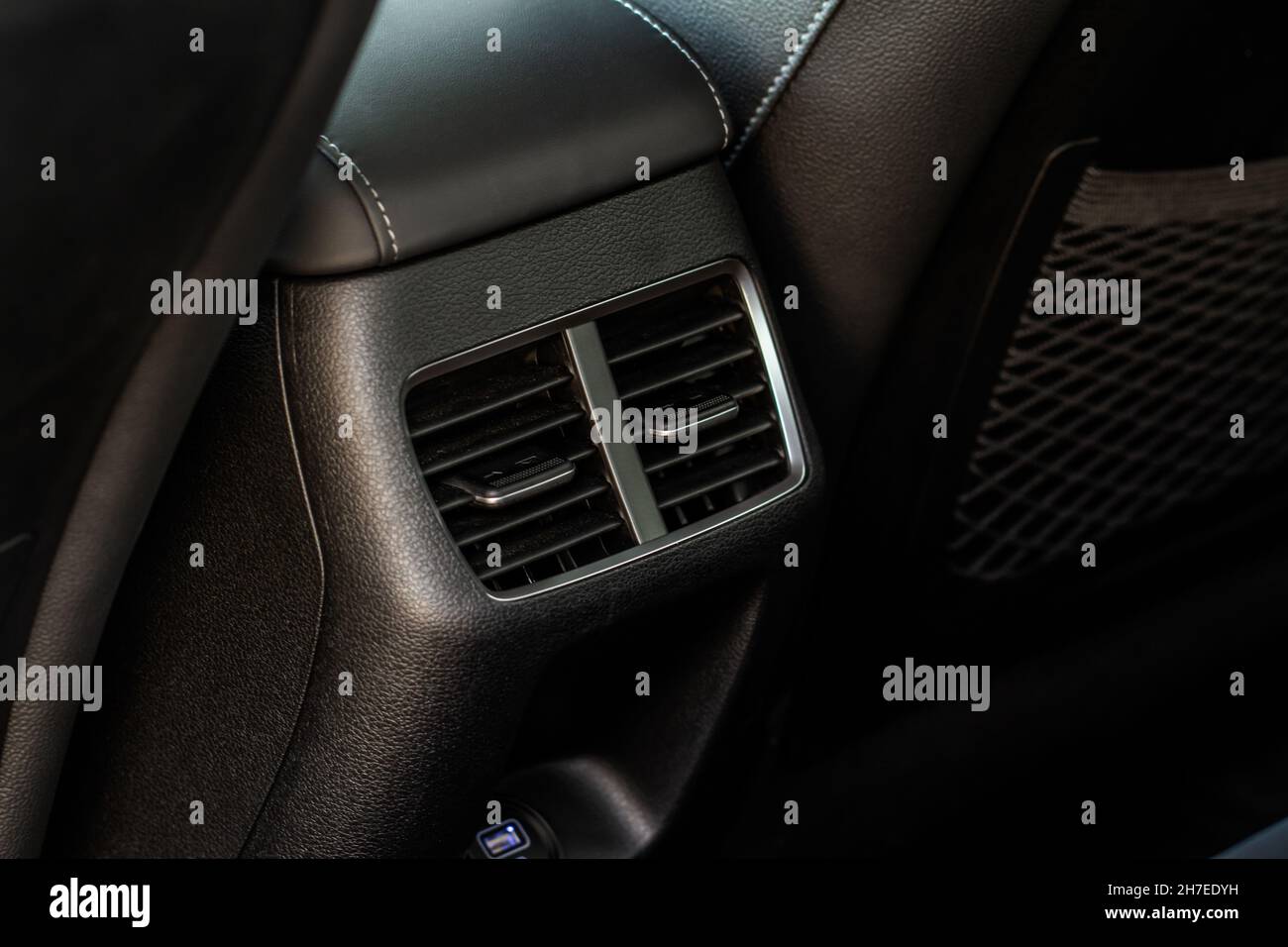 Car air conditioning close up view. The air conditioner flow inside the ...