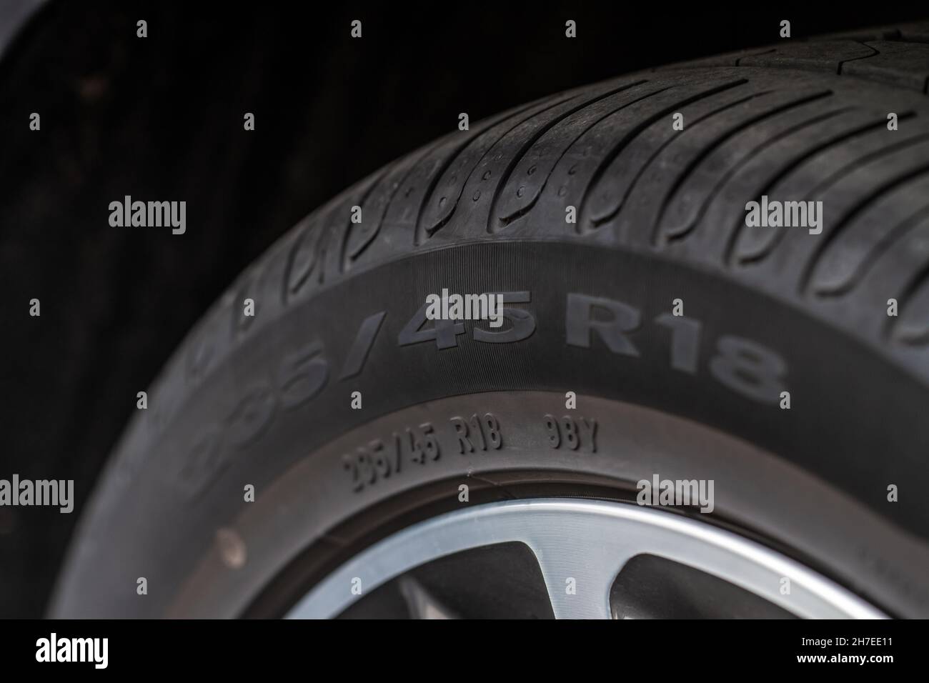 Close up view of tire with tire width, height and wheel diameter ...