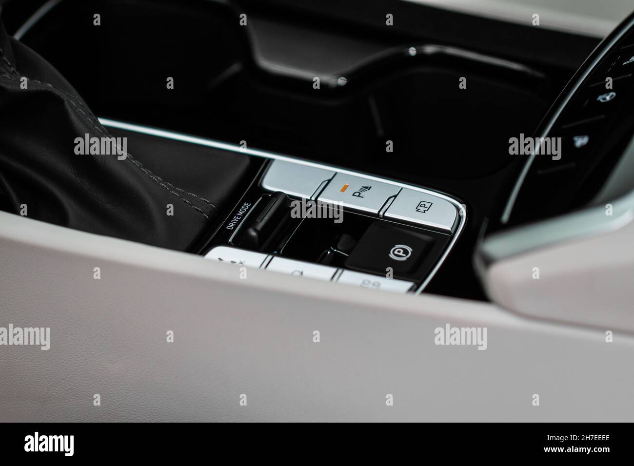 Electric handbrake button of modern car. Modern parking brake close up ...