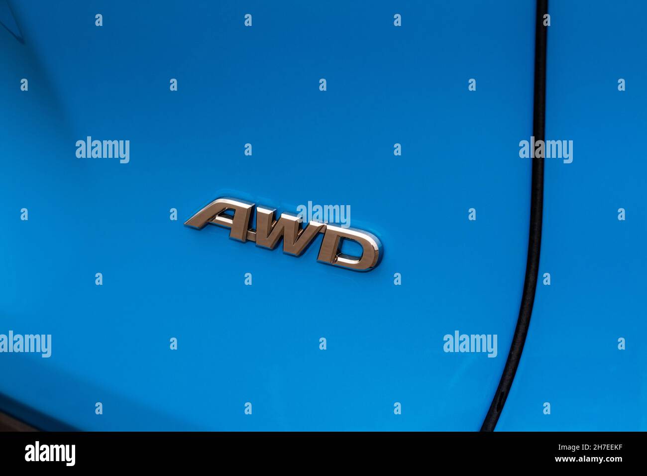 AWD emblem on modern black SUV car detail close up view. All Wheel ...
