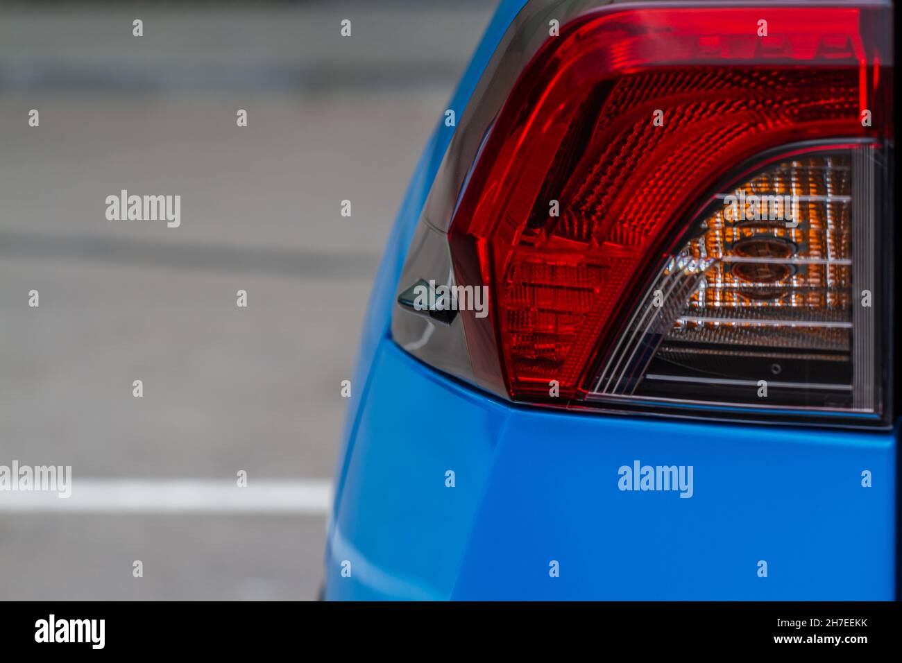 Modern rear light of a car. Brake light and arrow of large suv. Rear ...