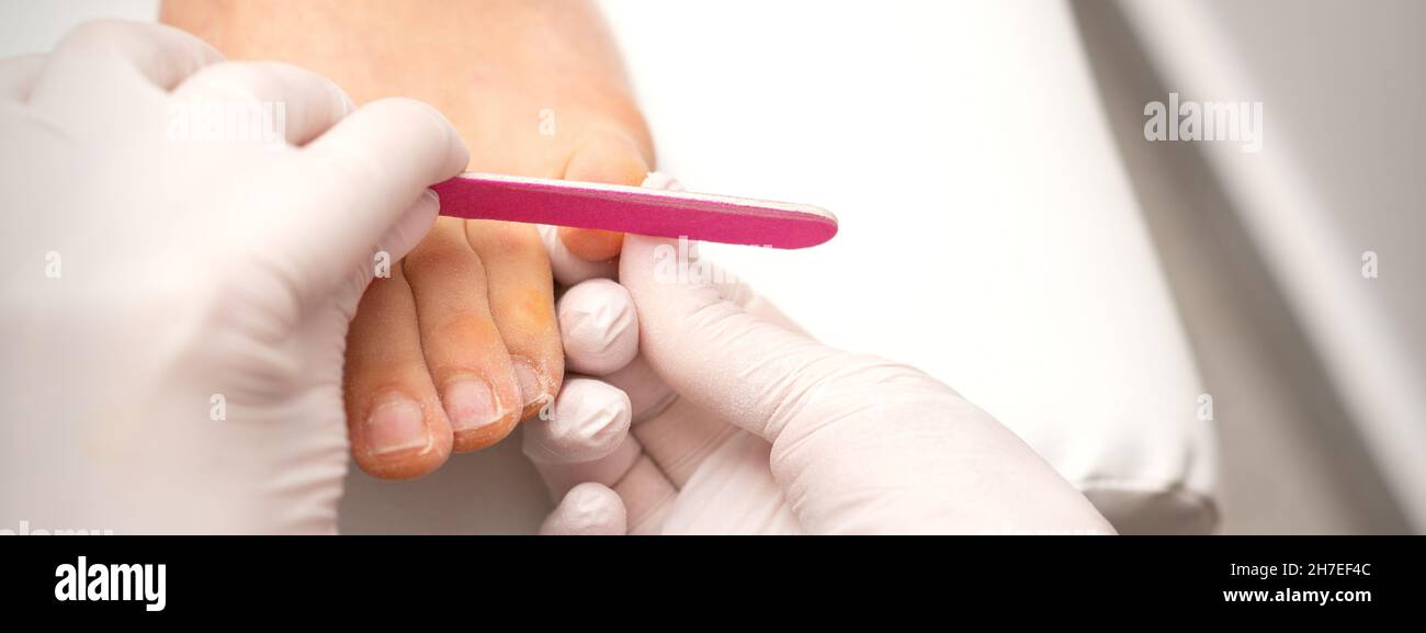 Filing toenails woman hi-res stock photography and images - Alamy