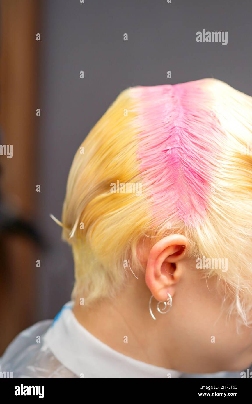 Applying hair dye roots woman hi-res stock photography and images - Alamy