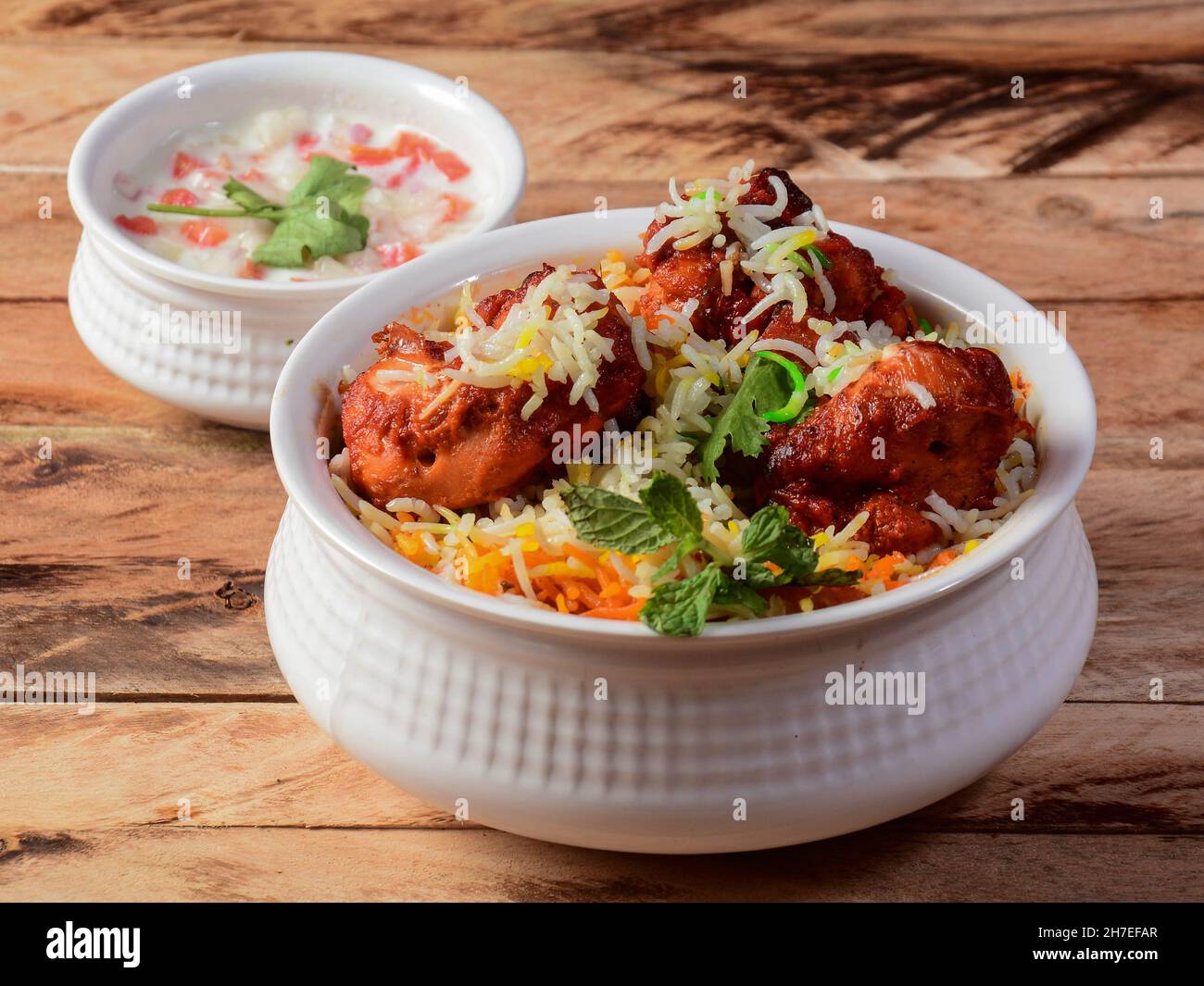 Chicken Tikka Biryani made of Basmati rice cooked with masala spices ...