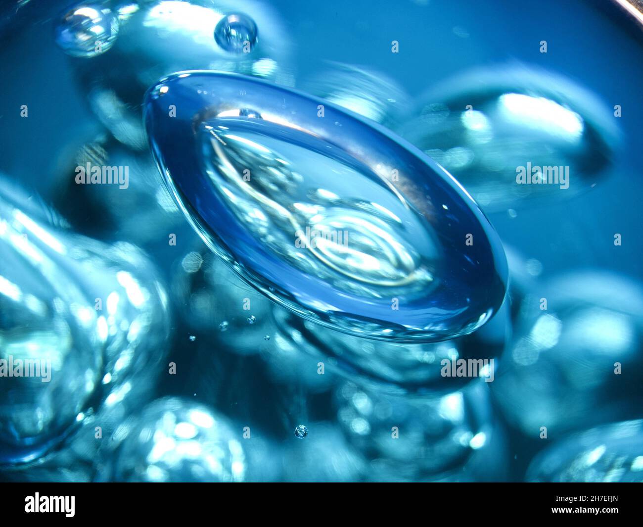 Closeup of the light blue bubbles in the water - good for wallpapers ...