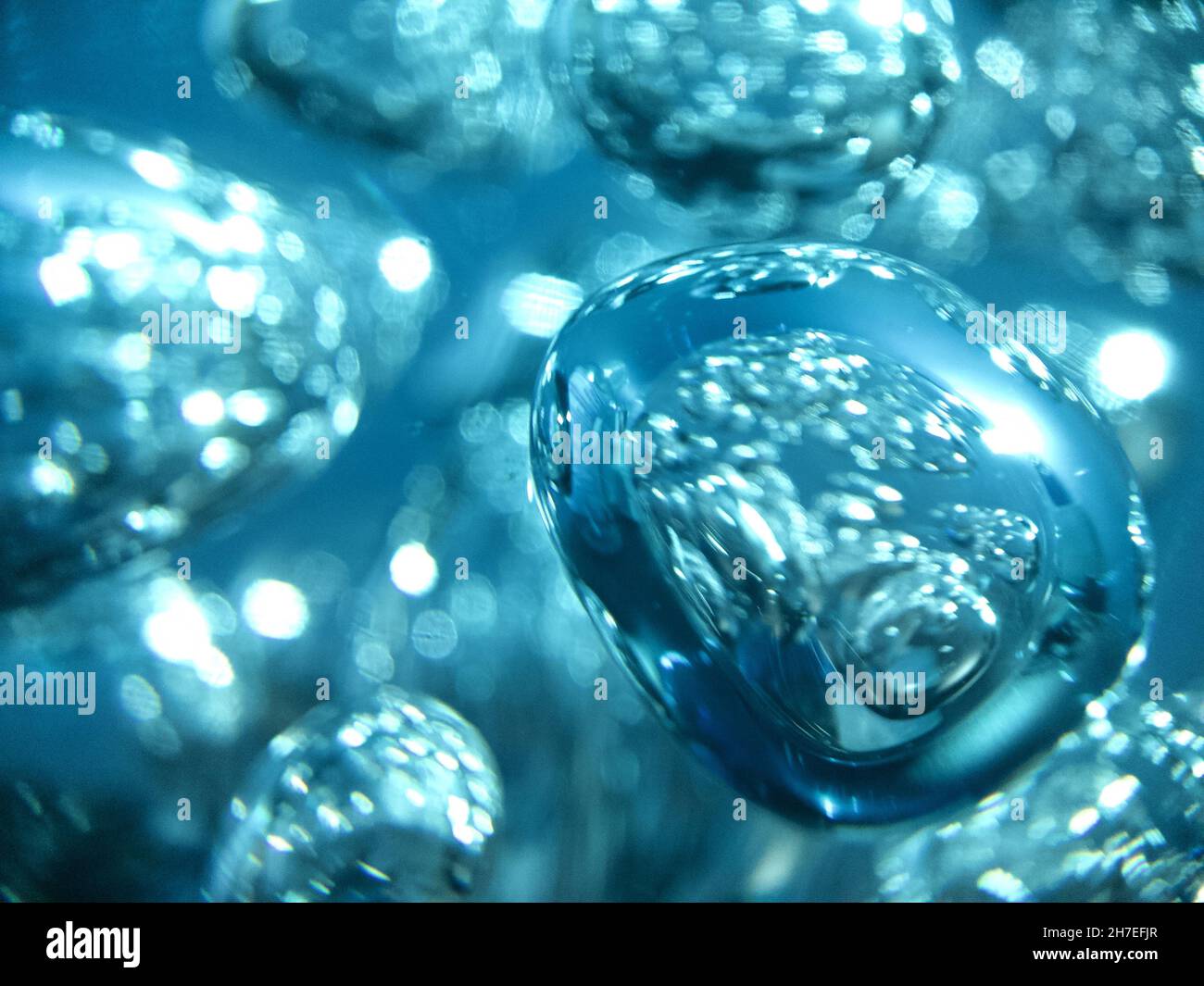 Closeup of the light blue bubbles in the water - good for wallpapers ...