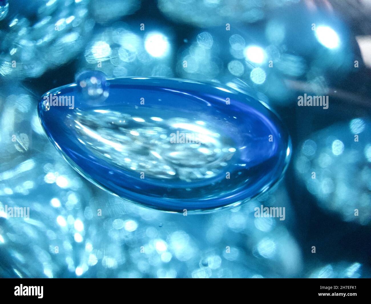 Closeup of the light blue bubbles in the water - good for wallpapers ...