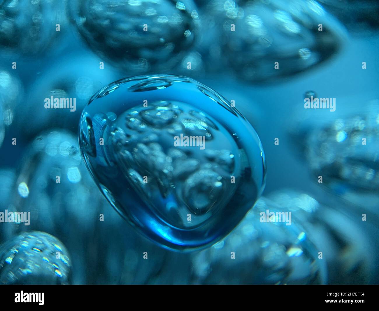 Closeup of the light blue bubbles in the water - good for wallpapers ...