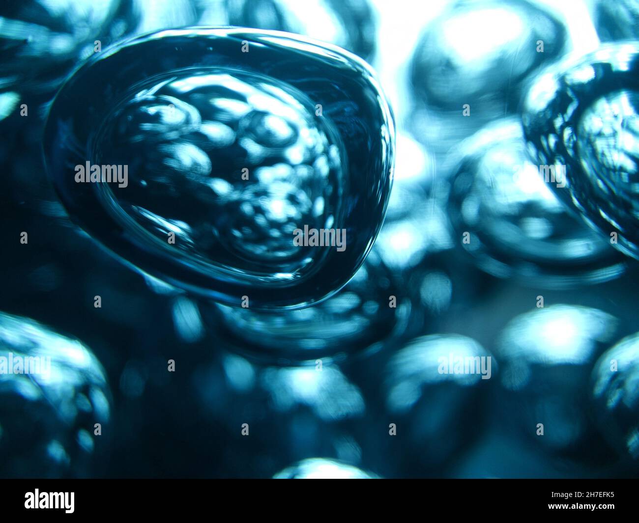 Closeup of the light blue bubbles in the water - good for wallpapers ...