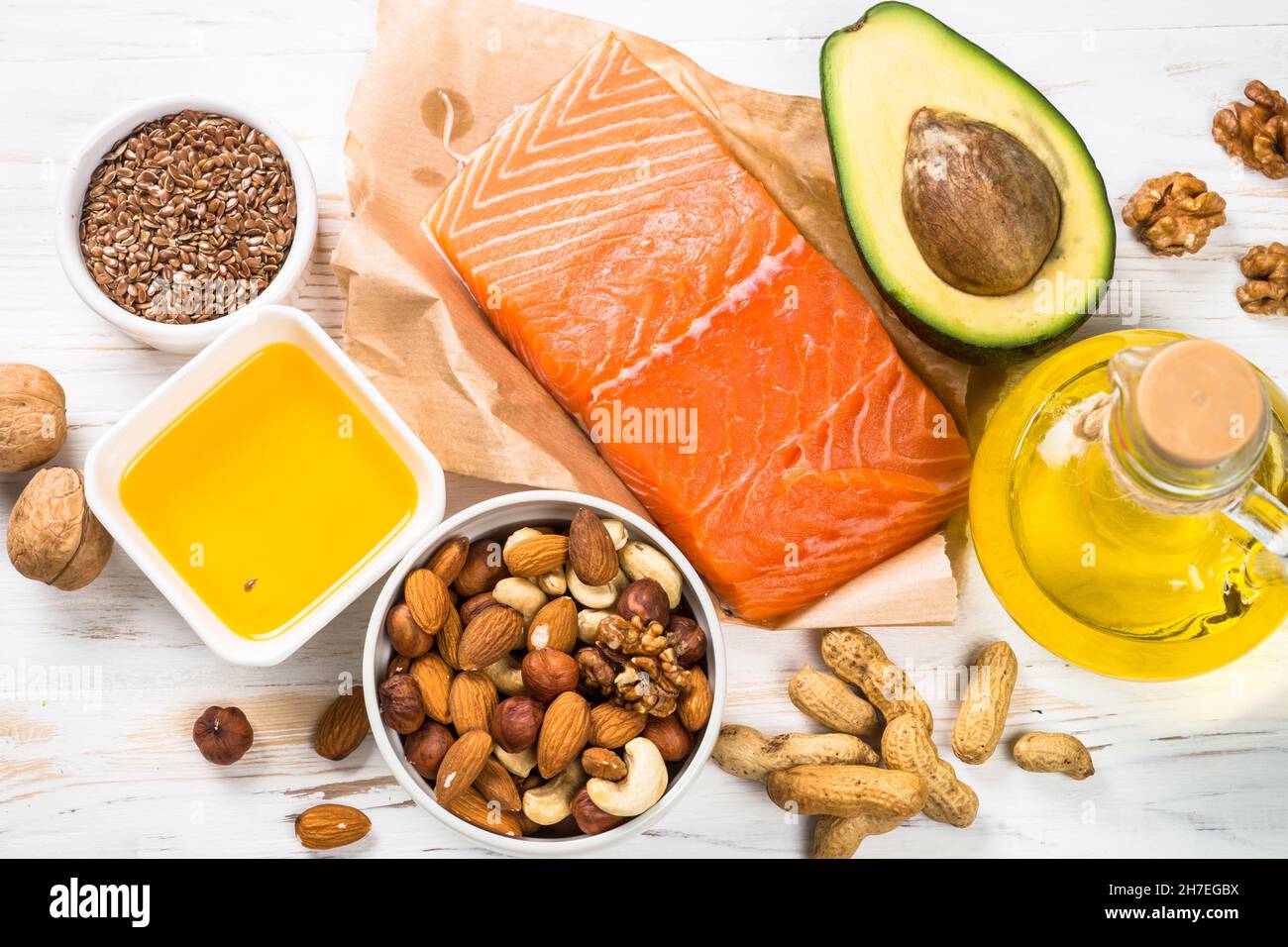 Healthy fats products at black background Stock Photo - Alamy