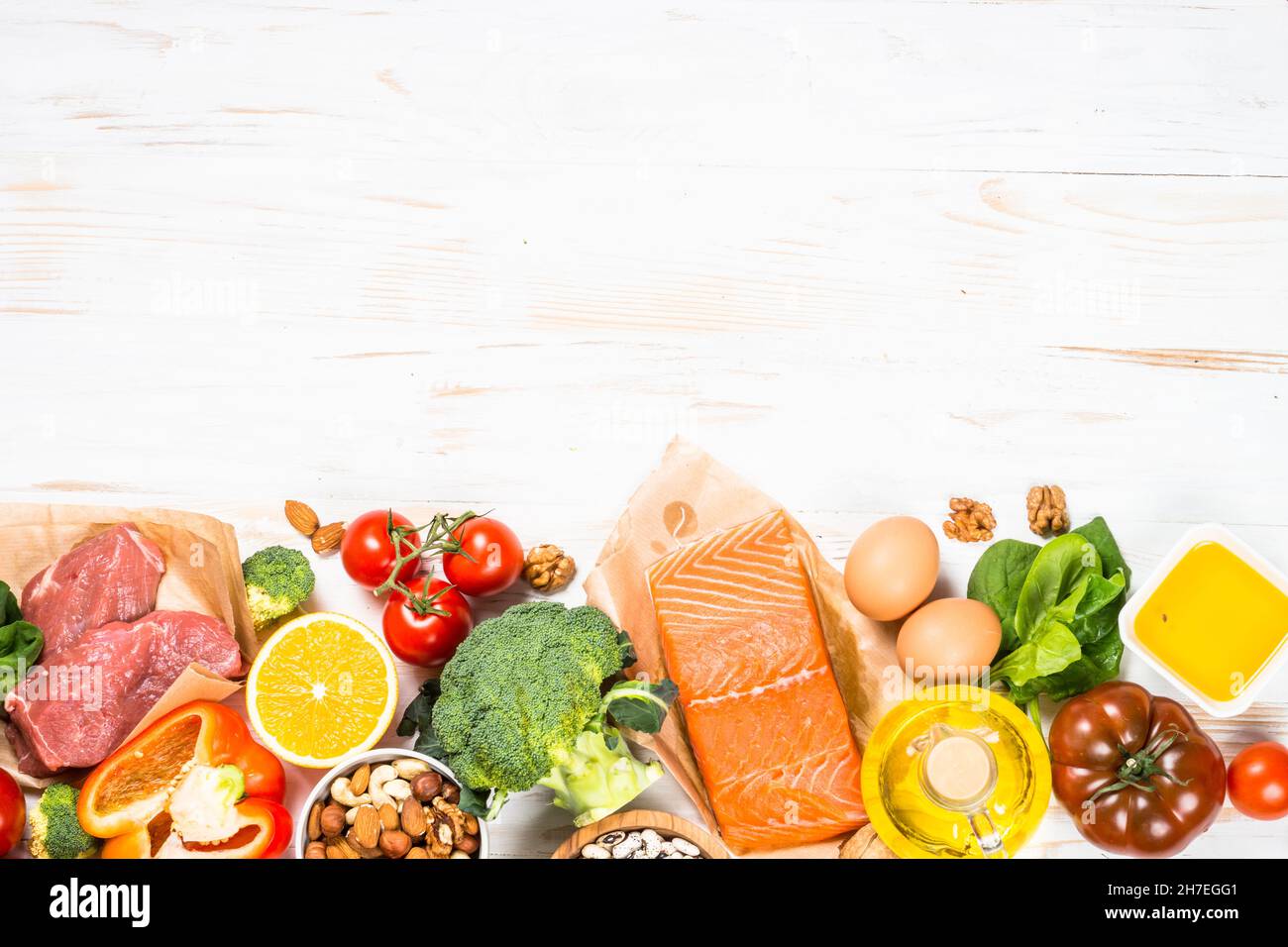Healthy fats products at black background Stock Photo - Alamy