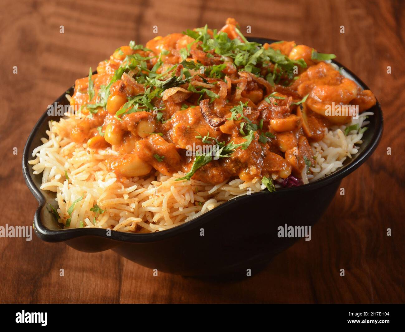 Traditional hyderabadi Kaju biryani with kaju curry, selective focus ...