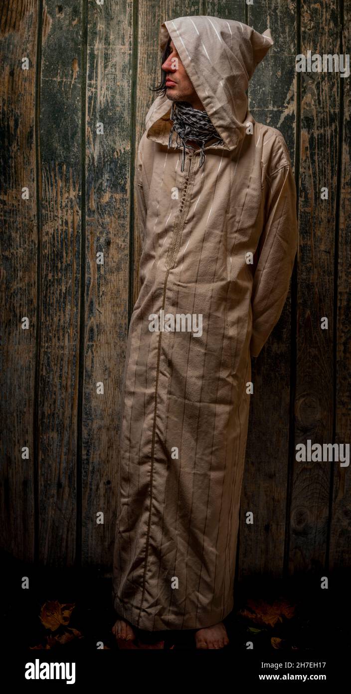 Tall man long priest hi-res stock photography and images - Alamy