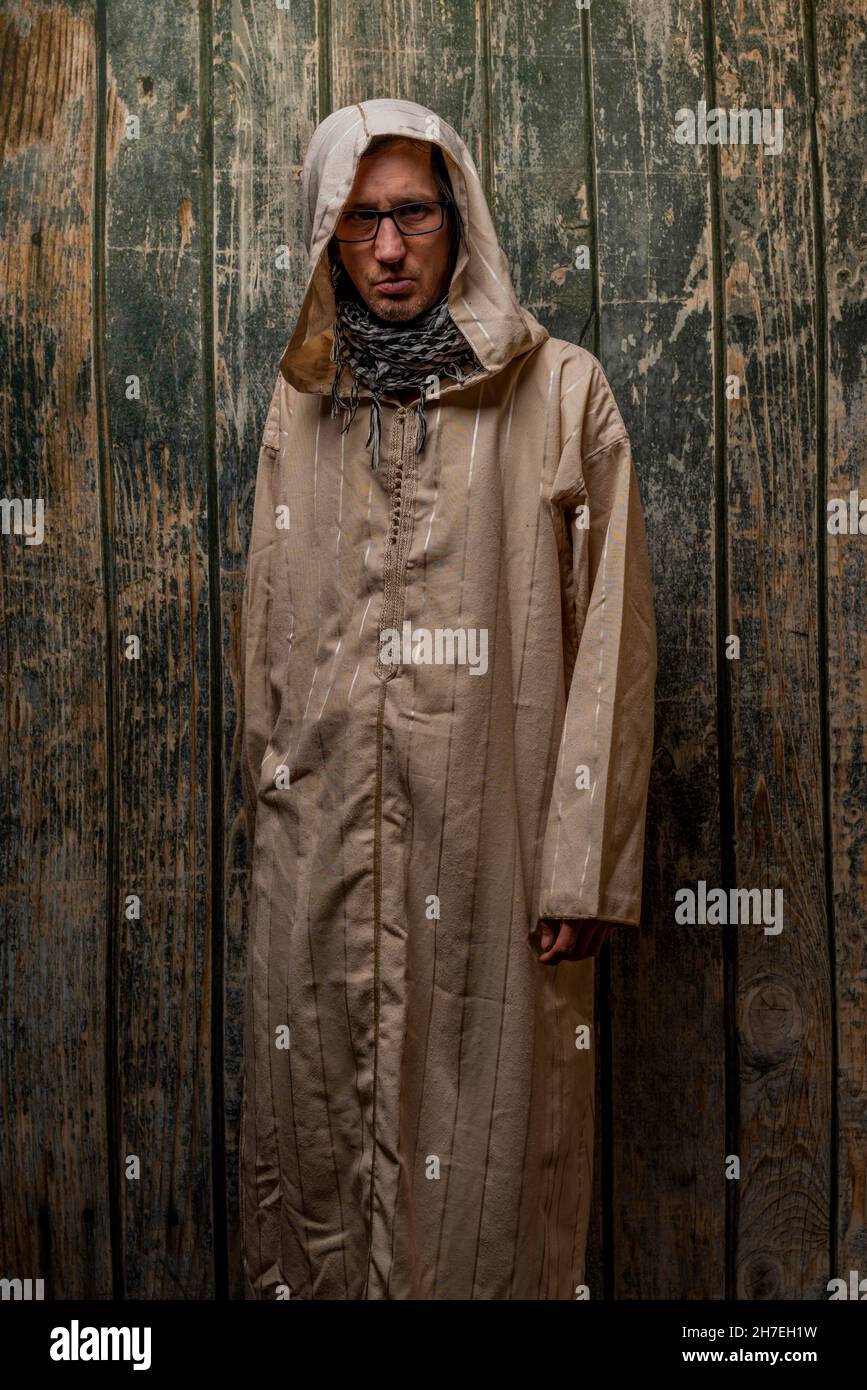 Tall man long priest hi-res stock photography and images - Alamy