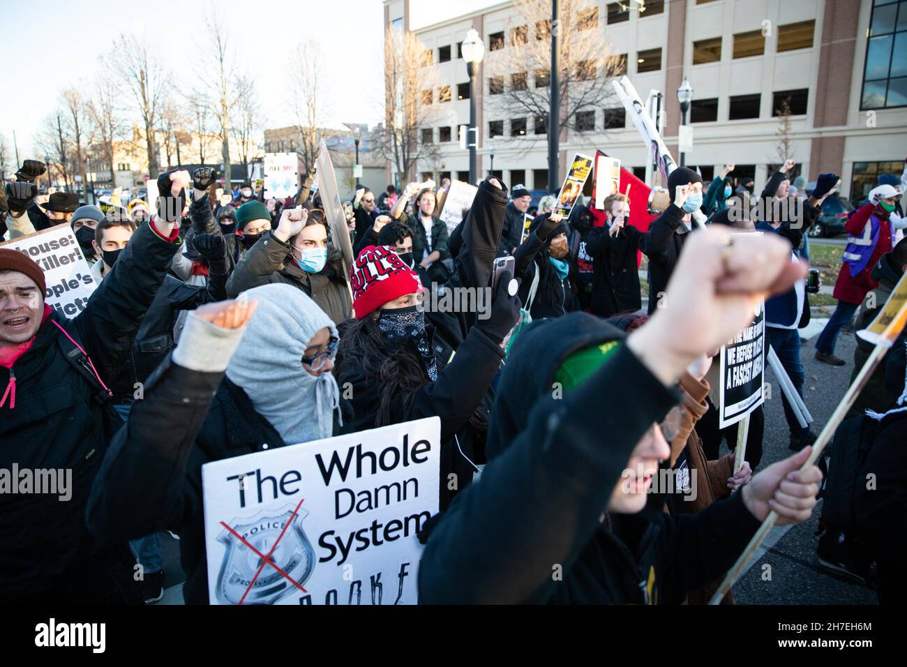 Kenosha, United States. 21st Nov, 2021. Protesters hold placards and ...