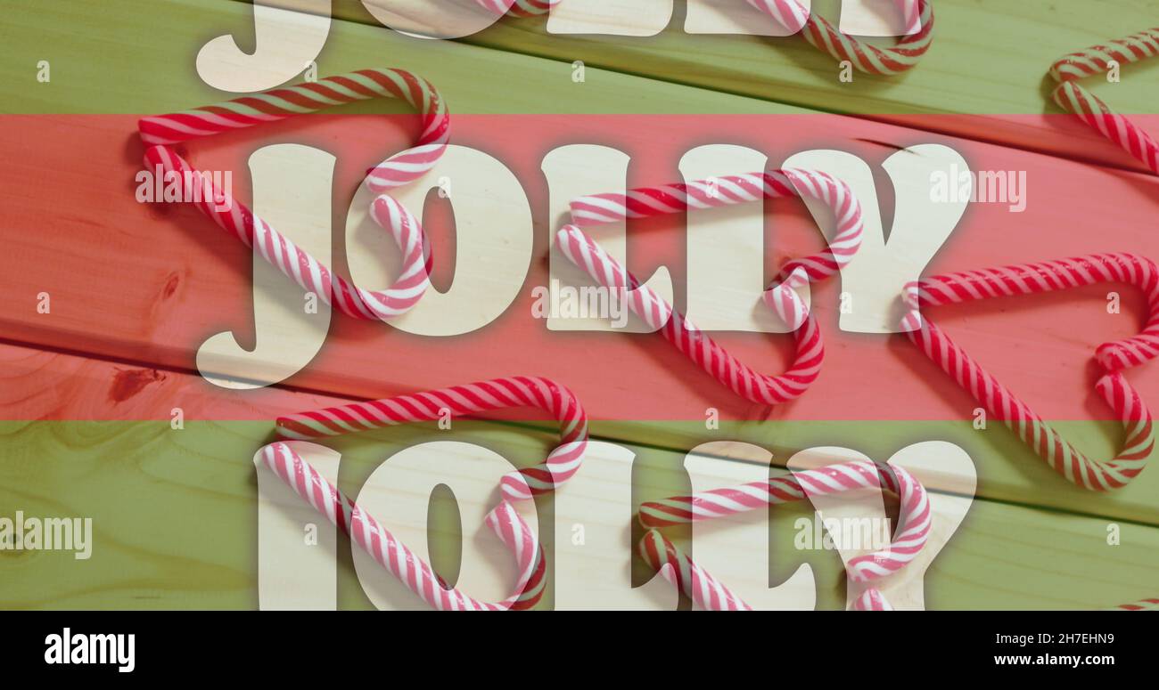 Image of jolly text on red and green stripes over christmas candy canes ...