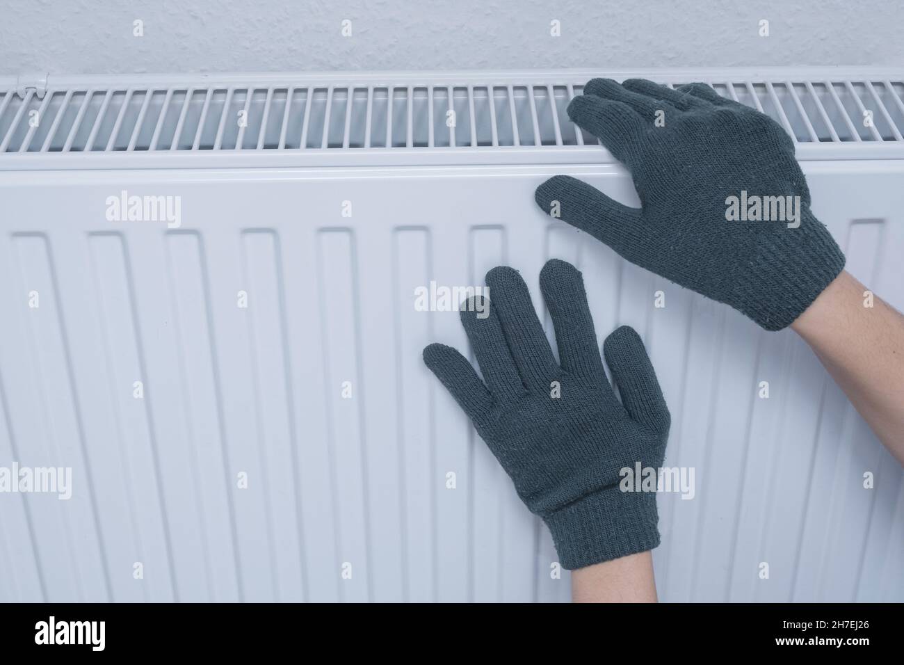 Female hands on radiator hi-res stock photography and images - Alamy