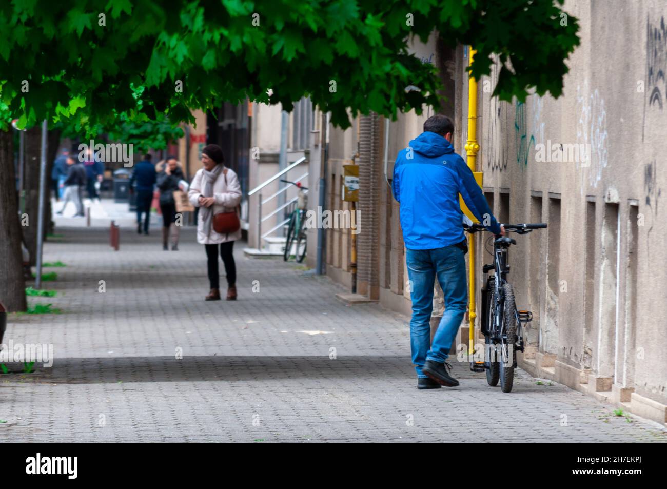 Timisoara, Romania - April 20, 2017: People walking on the street. Real ...