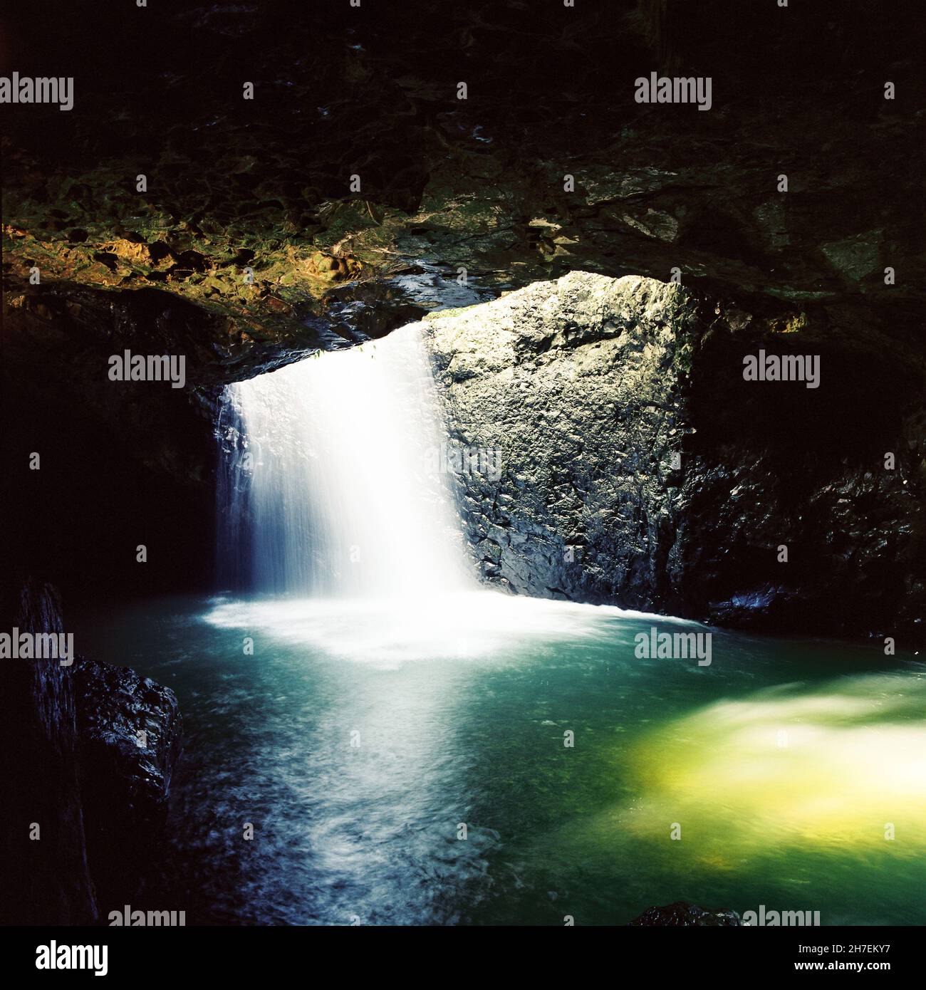 Natural Bridge waterfall in the Springbrook National Park, Queensland ...