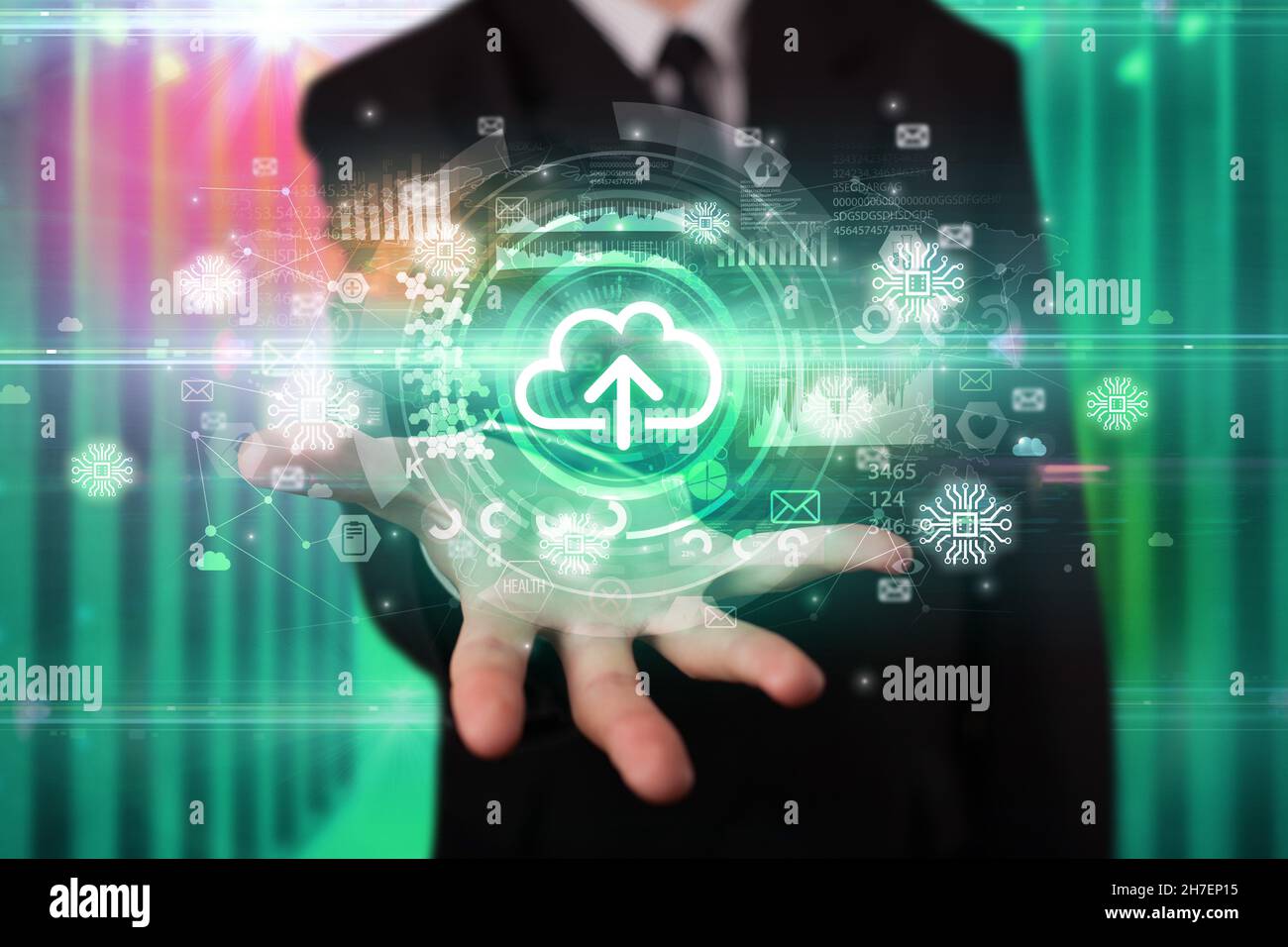 Businessman holding technology icon concept Stock Photo - Alamy