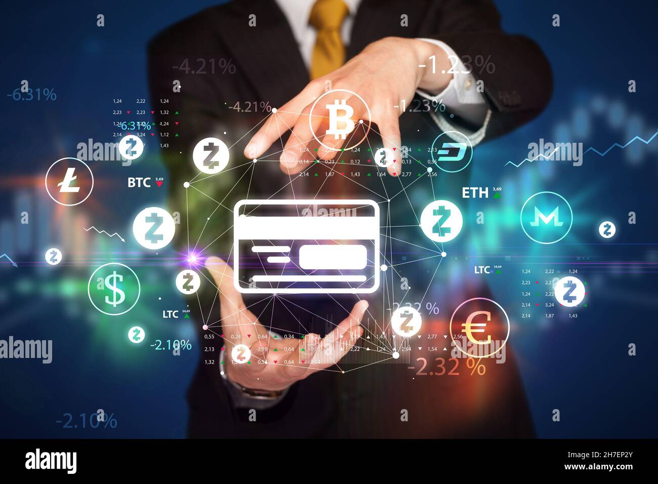 Businessman holding currency symbols concept Stock Photo - Alamy