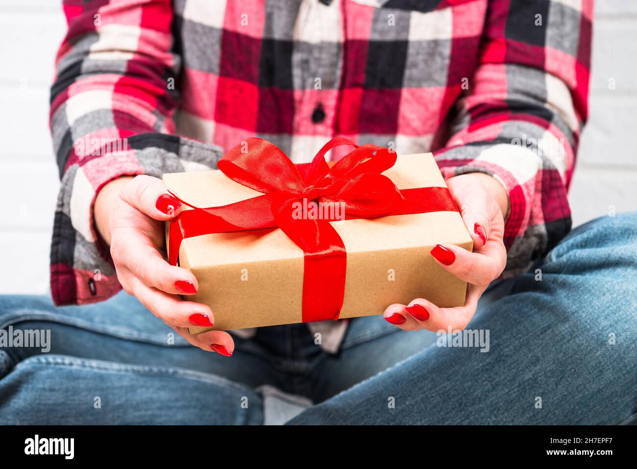 Happy woman in red wrapping hi-res stock photography and images - Alamy