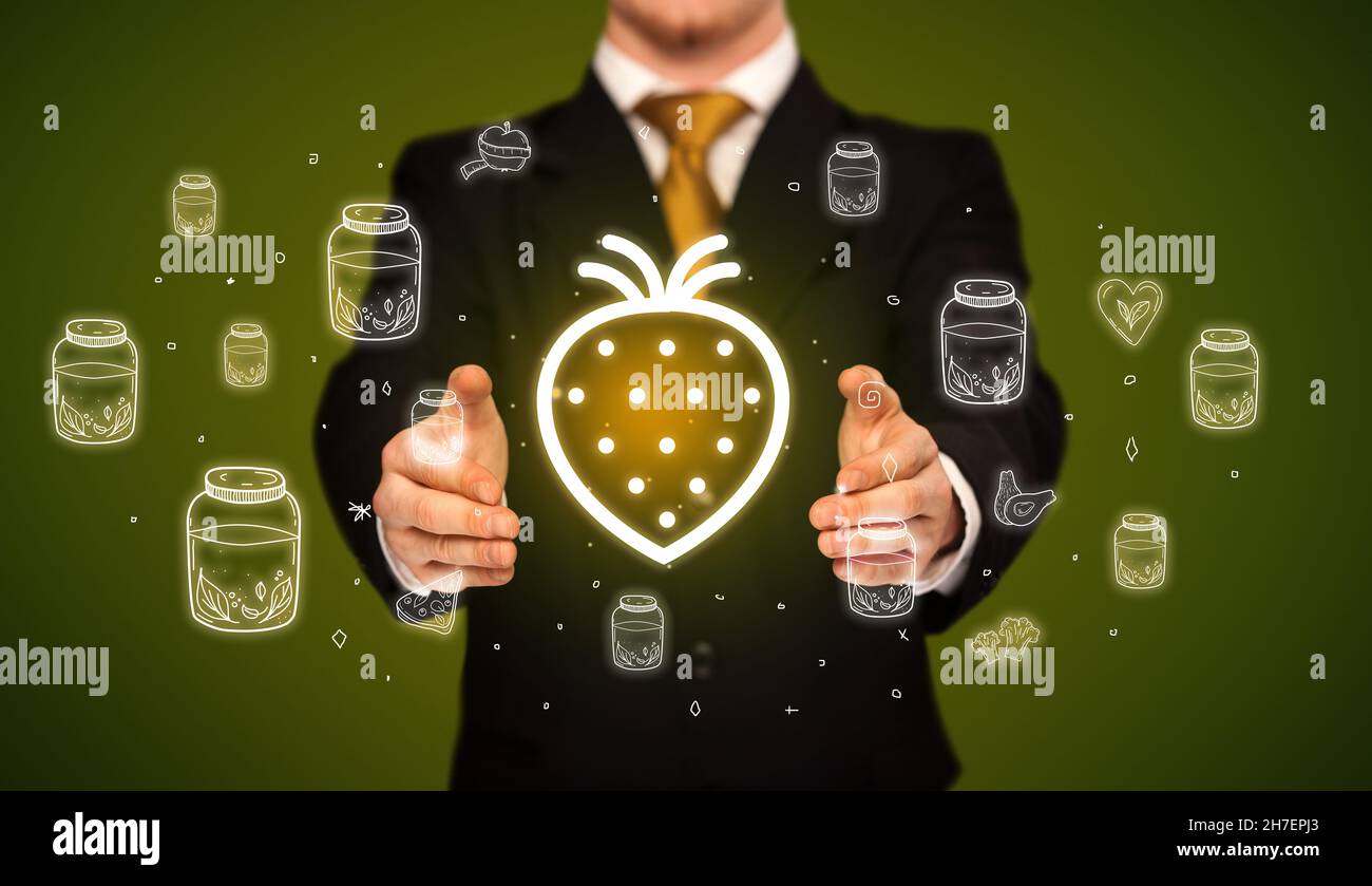 Hand holding food related icons Stock Photo - Alamy