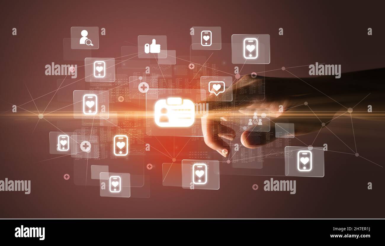 Hand pressing social media multimedia application screen with media ...
